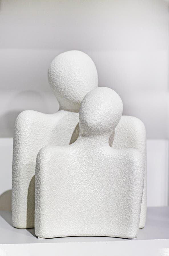 Conceptual Tabletop White Figurines of a Woman and a Man. Stock Image ...