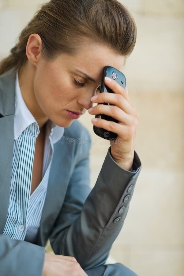 Concerned Business Woman with Mobile Phone Stock Image - Image of ...