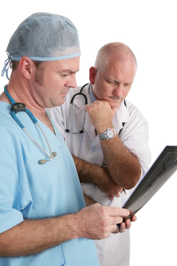 Concerned Doctors with Xrays Stock Image - Image of intern, orthopedic ...