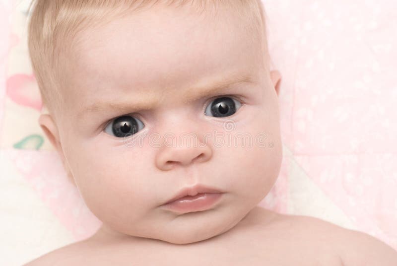 Concerned Newborn Baby stock image. Image of girl, expression - 16428131