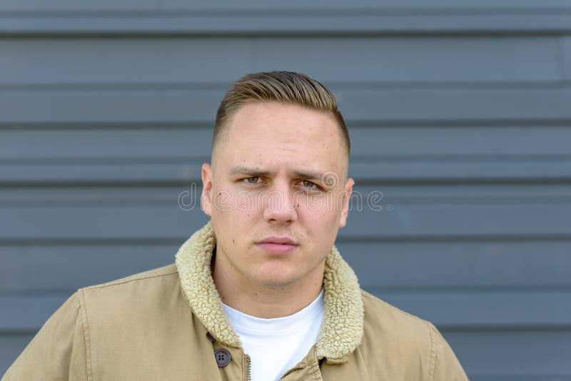 Concerned Young Man Staring Intently at the Camera Stock Photo - Image ...