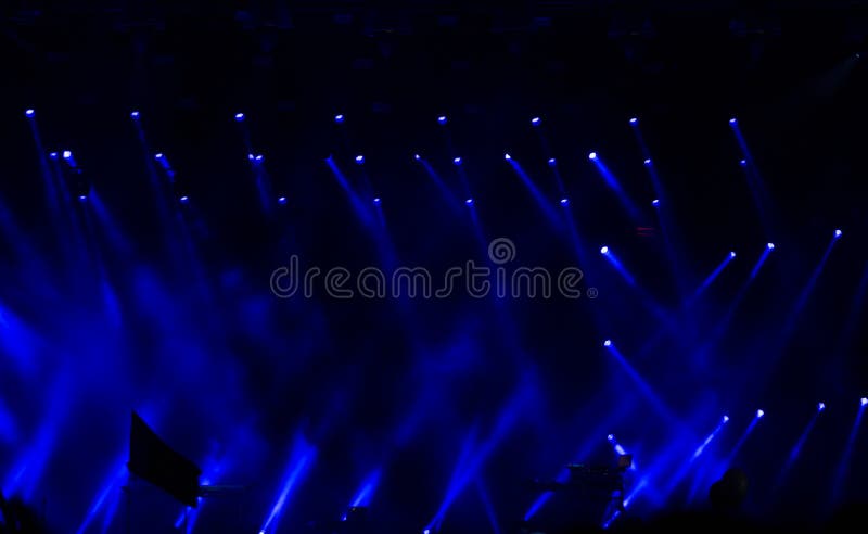 Concert Crowd in Front of Bright Stage Lights Stock Photo - Image of ...