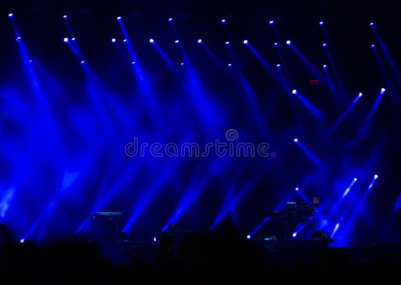 Concert Crowd in Front of Bright Stage Lights Stock Image - Image of ...