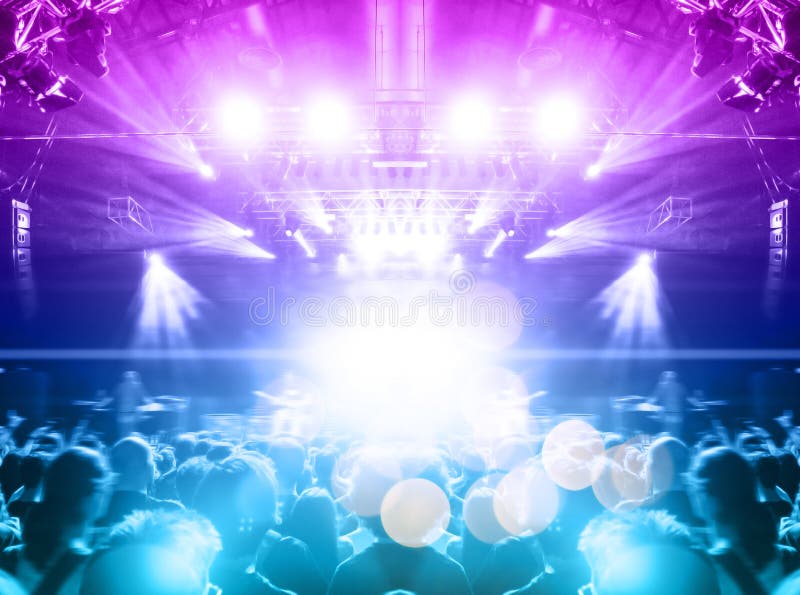 Concert Crowd Silhouettes in Front of a Bright Stage Stock Photo ...