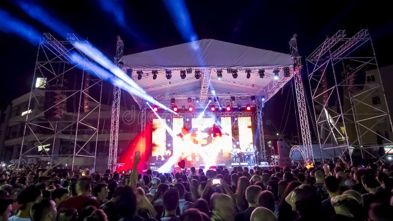 Concert Crowd Silhouettes in Front of Bright Stage Lights Stock Photo ...