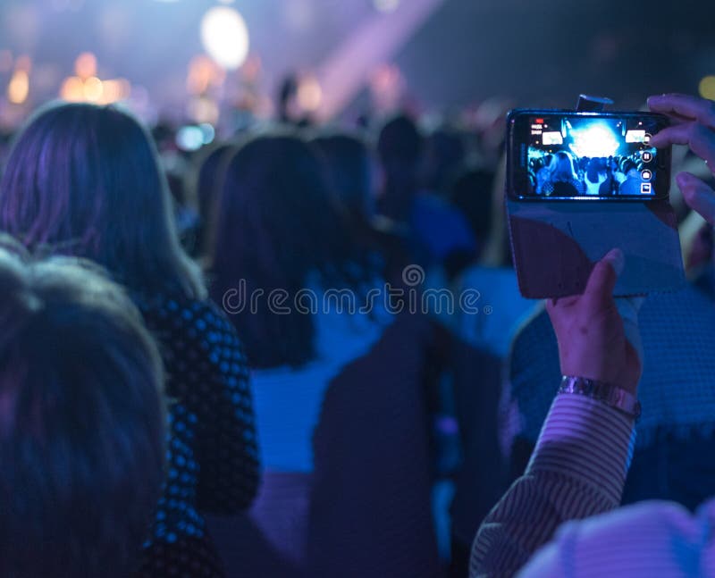 Concert with Mobile editorial stock image. Image of media - 53646309