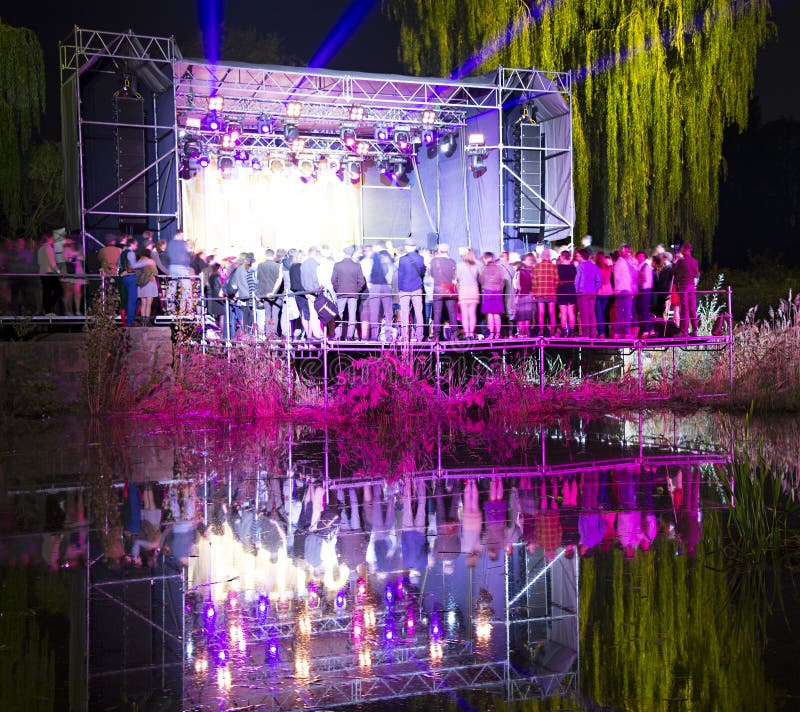 Concert stage in the pond stock image. Image of full - 65616353