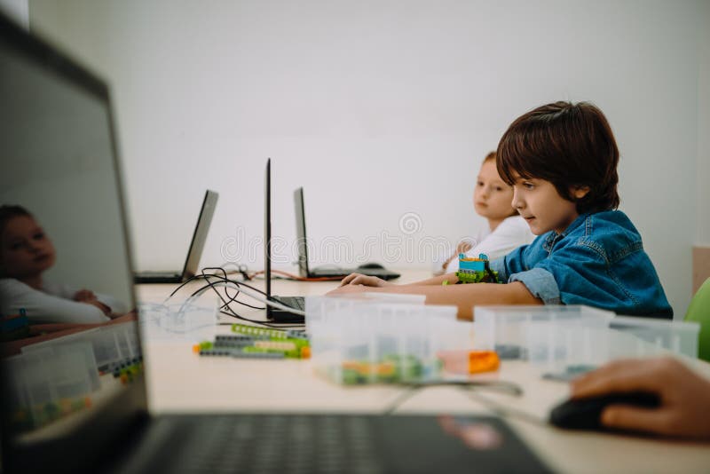 Concetrated Kids Working with Computers on Stem Stock Photo - Image of ...