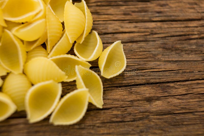 Conchiglie Pasta on Wooden Surface Stock Image - Image of noodle ...