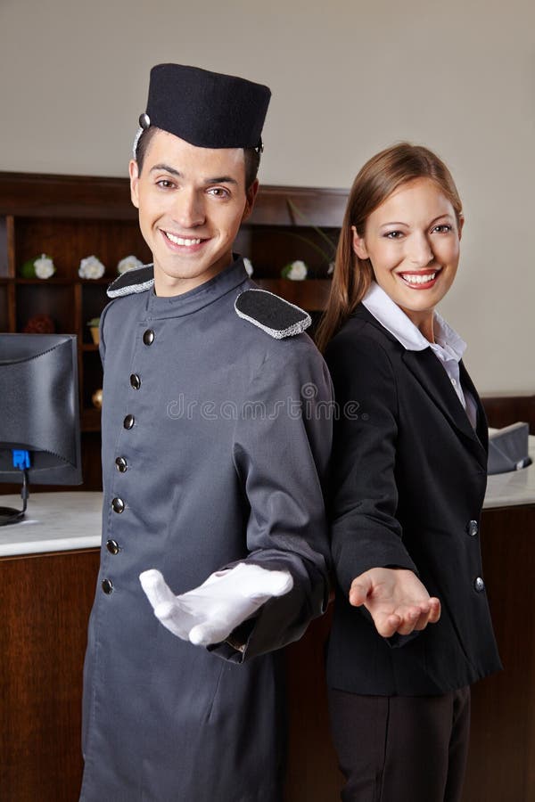 Concierge and Receptionist in Hotel Stock Photo - Image of smile, hand ...