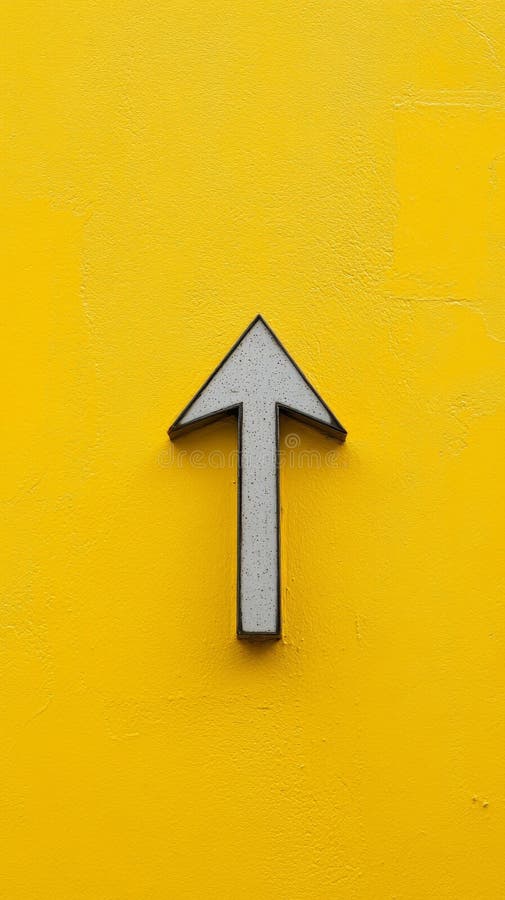 Concrete Arrow on Yellow Wall Stock Photo - Image of simplicity ...