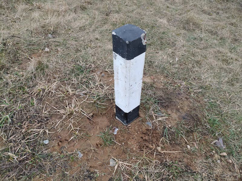 Concrete Black and White Pillar Kilometers in Field Stock Photo - Image ...