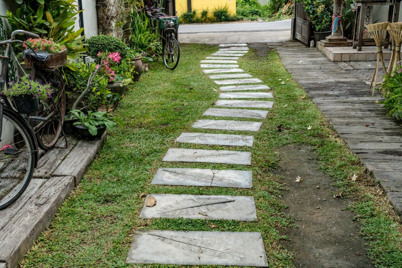 Concrete Pathway in garden stock image. Image of beautiful - 114379661