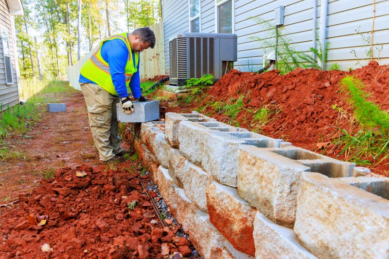 Installation of Concrete Block Retaining Walls Was Performed by a ...