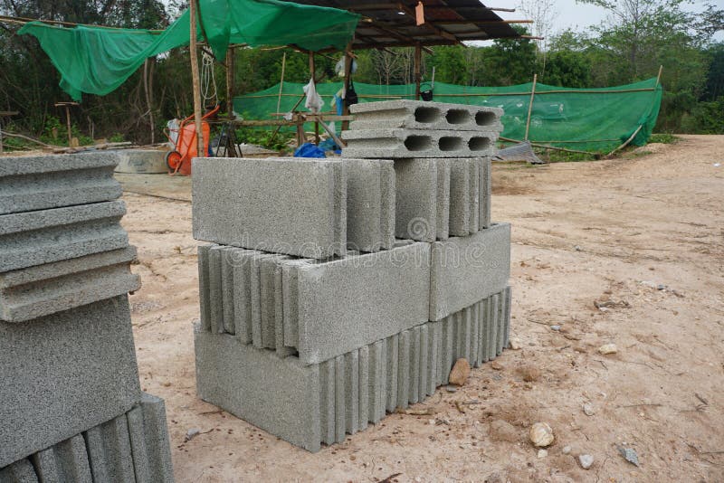Stacked Rectangular Concrete Blocks on the Construction Site. Building ...