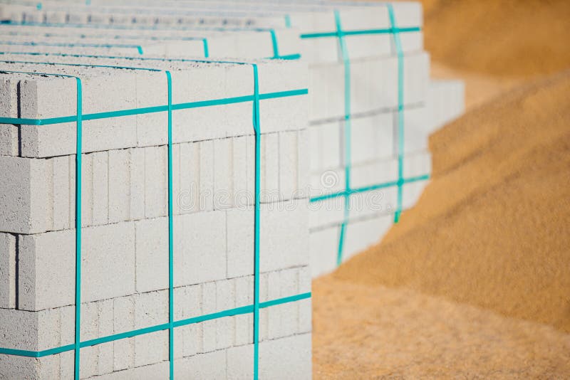 Concrete Blocks, Bricks, Bagged and Tied with a Blue Ribbon Stock Photo ...