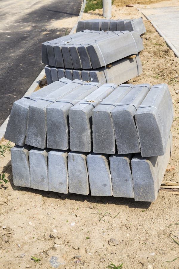 Concrete blocks for curbs stock photo. Image of roadside - 223555374