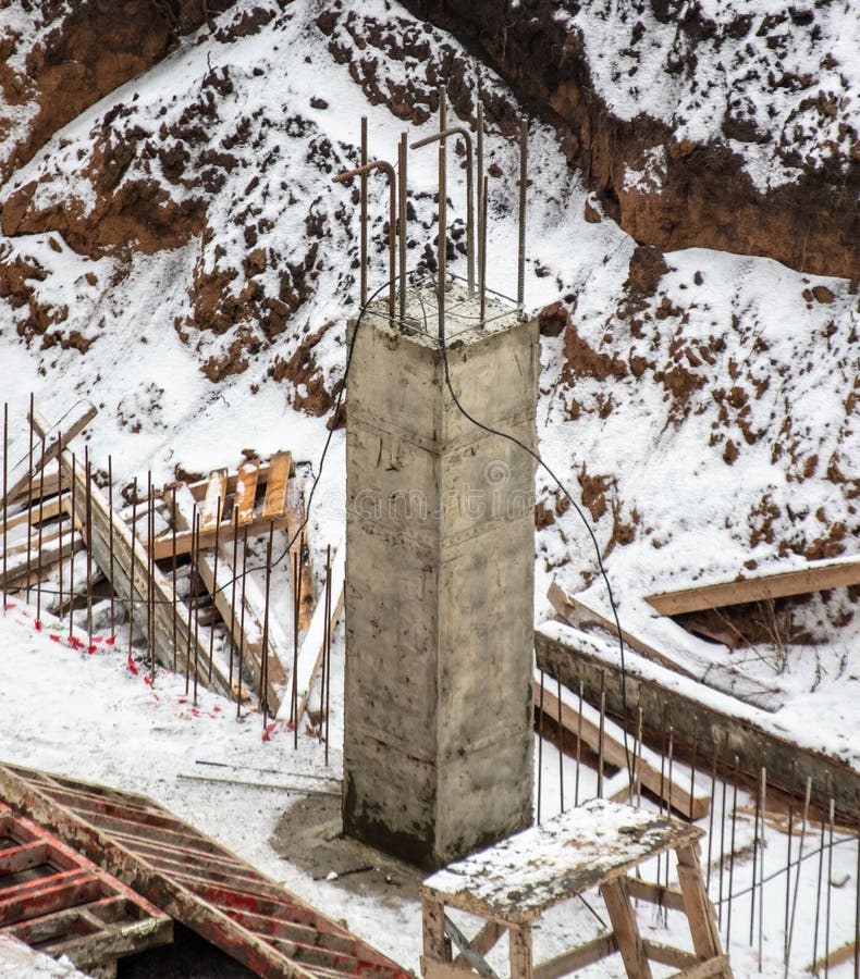 Concrete Blocks for the Foundation in the Snow in Winter at a ...