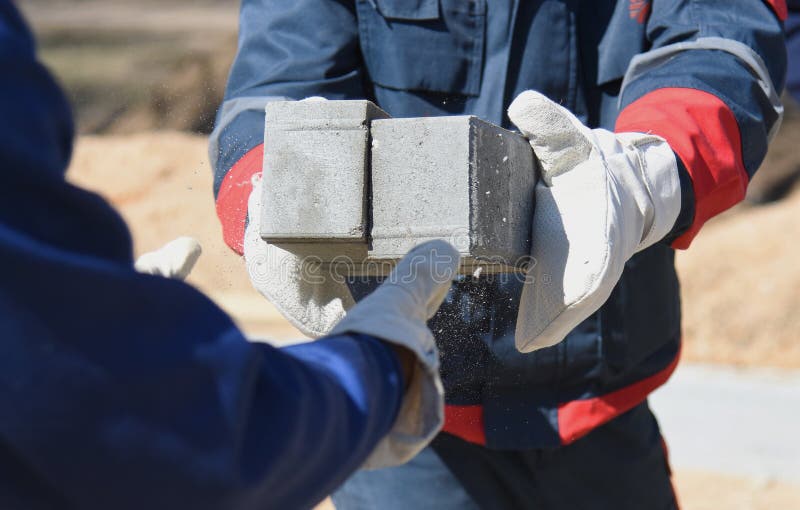 Concrete Blocks in the Hands of Workers. Stock Photo - Image of brick ...