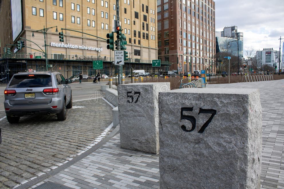 Concrete Blocks on Sidewalk with Car Passing Intersection Editorial ...