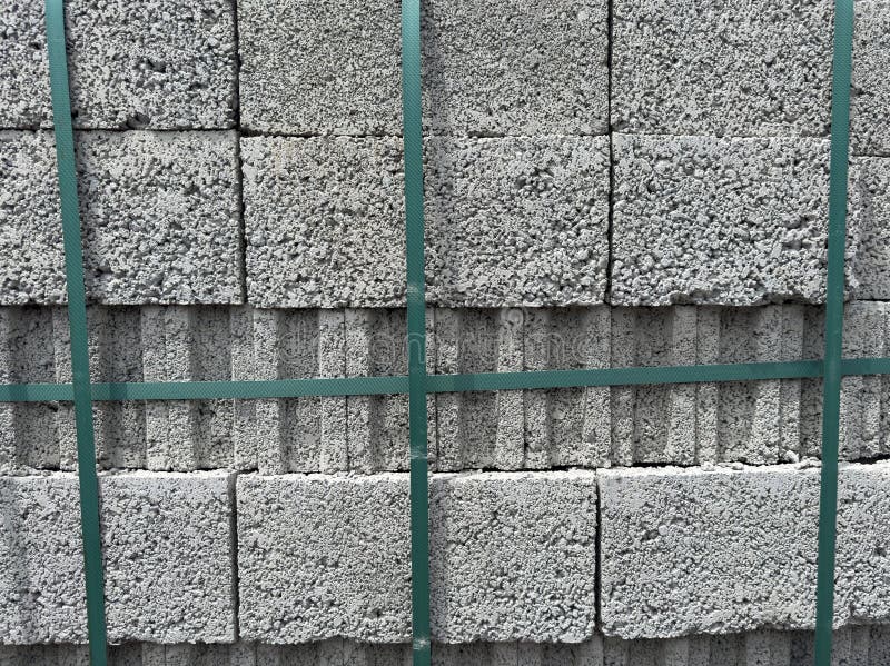 Concrete Blocks Stacked with Green Packaging Straps, Front View of ...