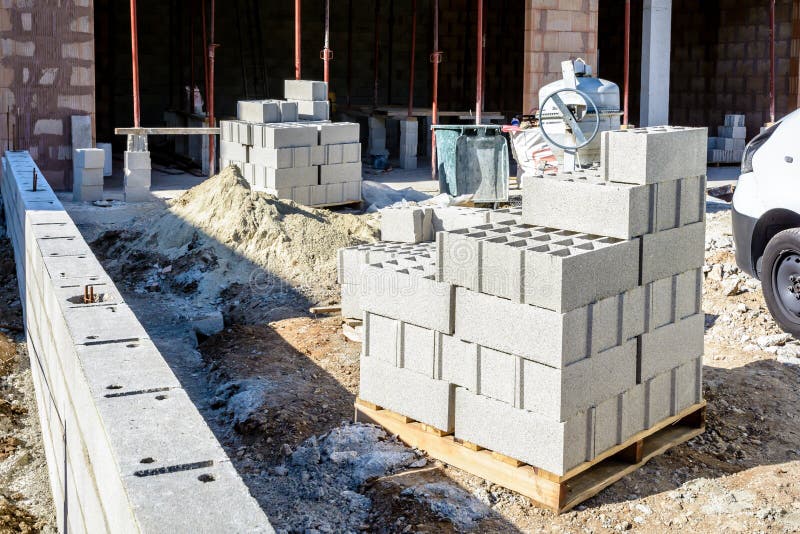 Concrete Blocks Stacked on Pallets Outdoors on a Construction Site ...