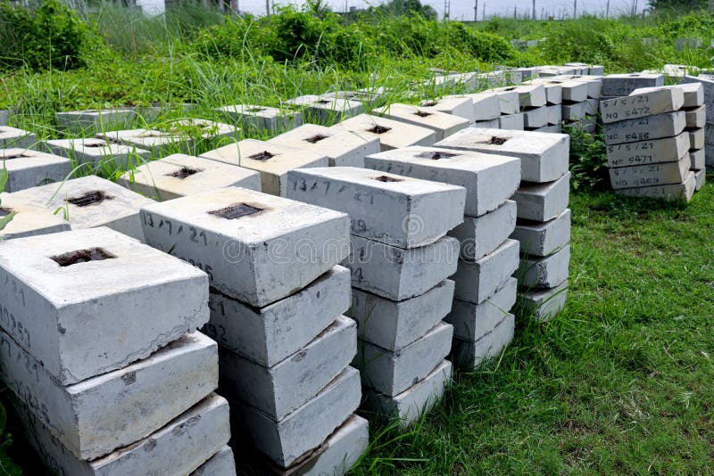 Concrete Blocks Stock on Construction Site Stock Photo - Image of pile ...