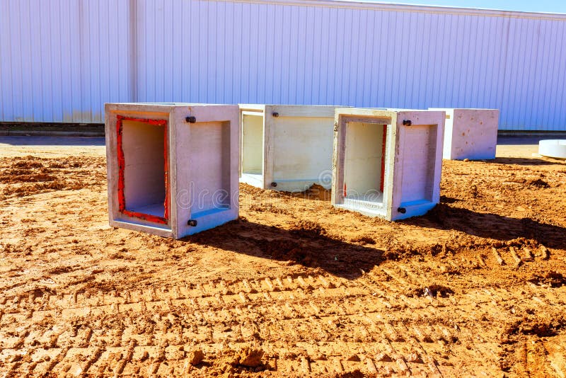 Concrete Boxes Placed on a Construction Site during the Daytime in a ...