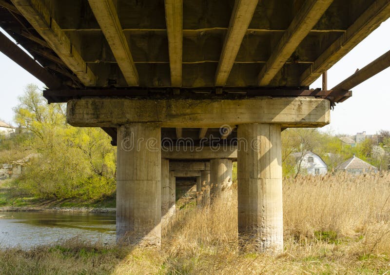 Concrete Bridge Dilapidated Pillars. Overpass Seen from Below Showing ...
