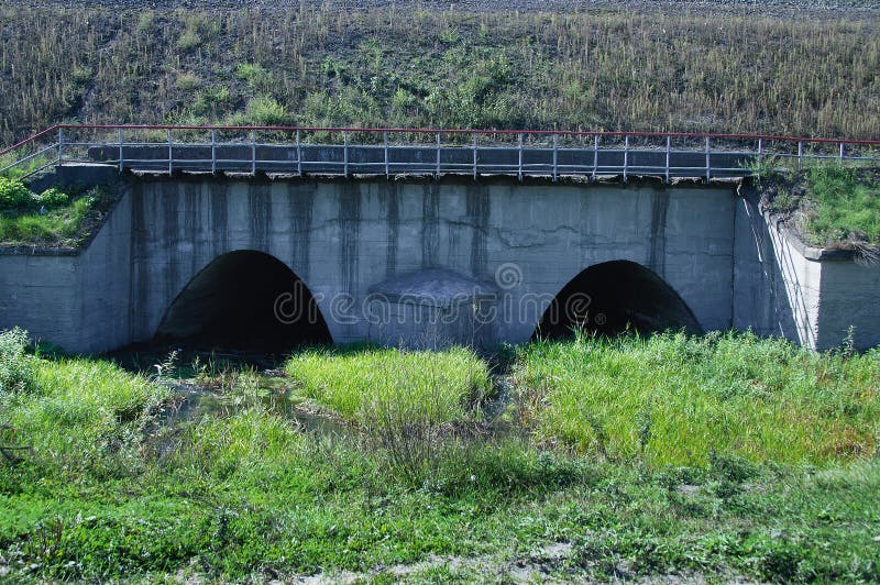 Concrete Bridge and Drain for River Water. in Afternoon Summer Stock ...