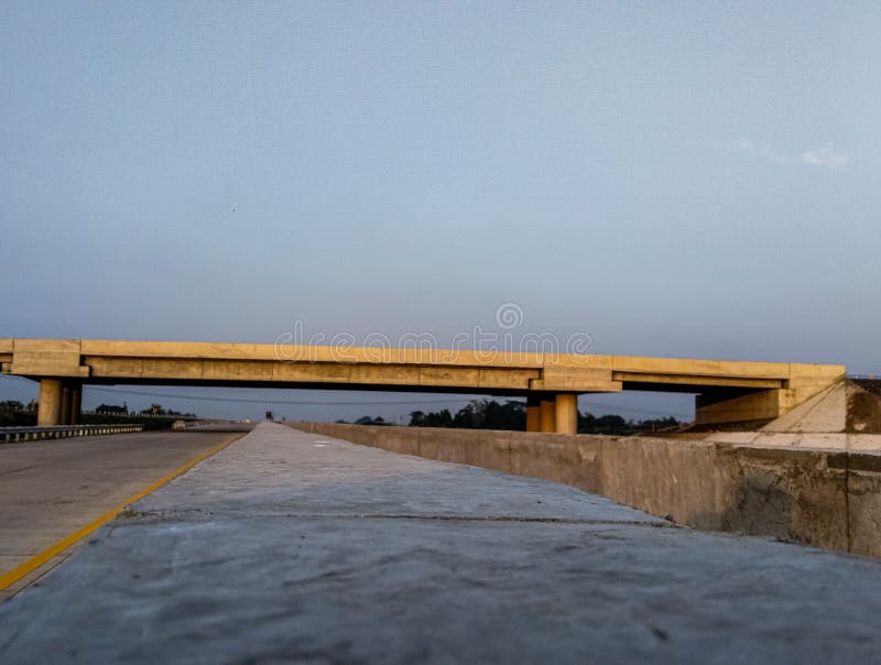 Concrete Bridge Over the Highway. the Highway is Quiet, and the Sky is ...