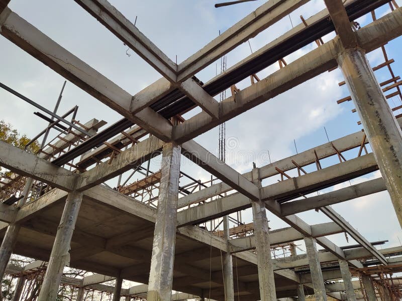 Concrete Building Structure Under Construction Against Blue Sky Stock ...
