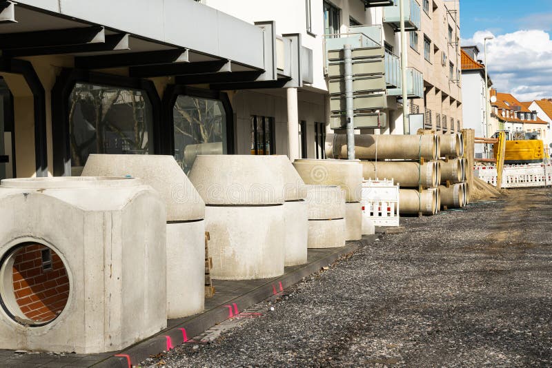 Concrete Building Structures and Pipes at the Construction Site. Stock ...