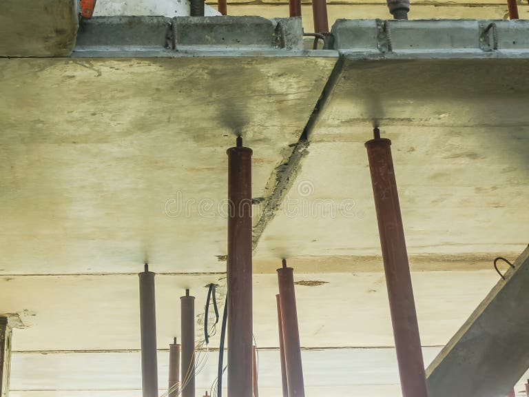 A Low-angle Shot Showing the Underside of a Concrete Ceiling with Metal ...