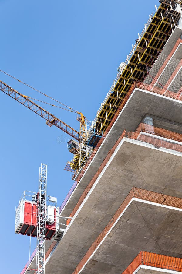 Concrete Construction Site for Big Building Foundation. Tower Cranes ...