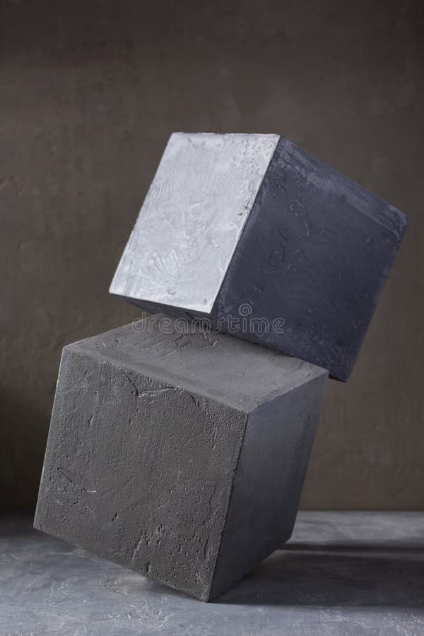 Concrete Cube Near Wall Background Texture. Art or Construction Concept ...