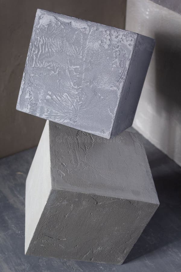 Concrete Cube Near Wall Background Texture. Art or Construction Concept ...
