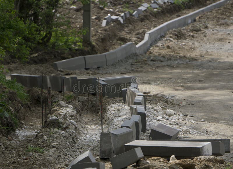 Concrete Curb Installation. String Line Level Guide is Stretched ...