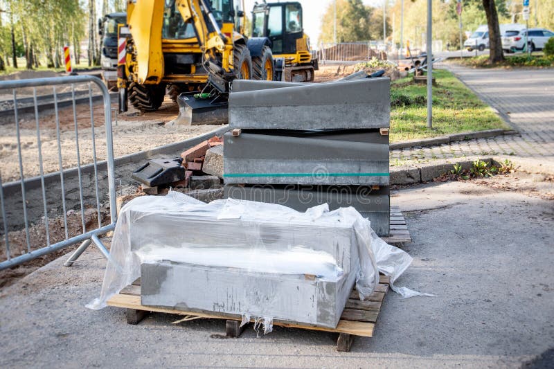 Concrete Curbs on Wooden Pallets. Road Construction Works Stock Photo ...