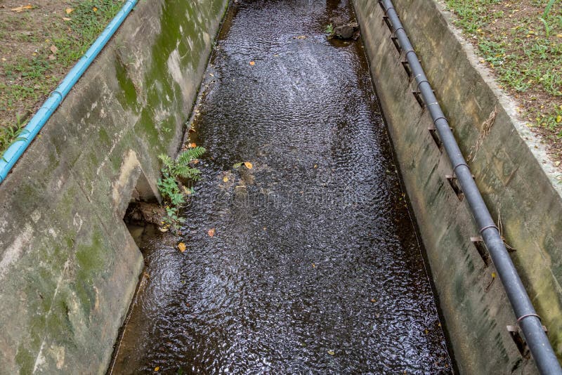 Concrete drainage canal stock photo. Image of canal, irrigation - 78208708