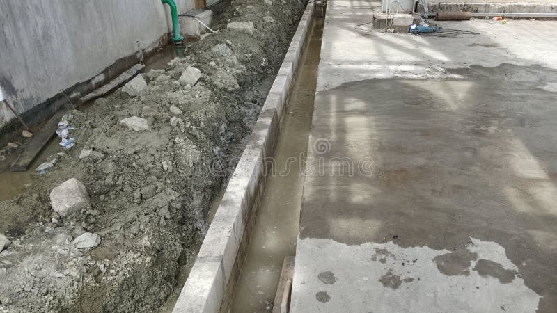 Concrete Drainage Ditch Under Construction at an Industrial Site Stock ...