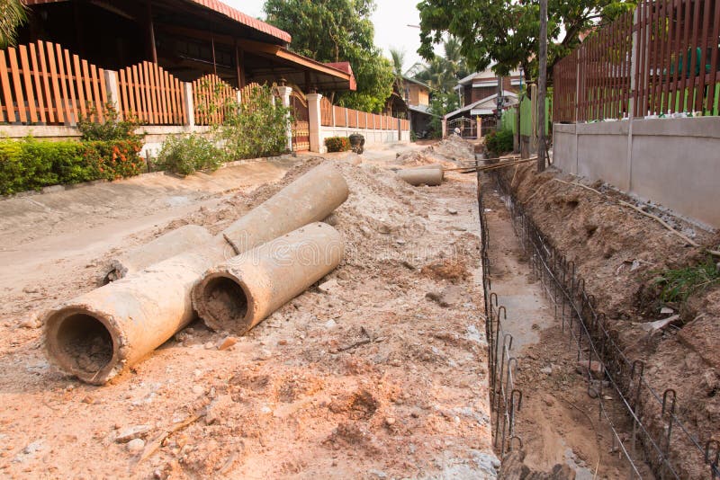 Concrete Drainage Pipe on a Construction Site .Concrete Pipe Stacked ...