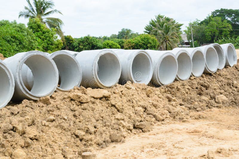 Concrete Drainage Pipes Stacked for Construction, Irrigation, in Stock ...