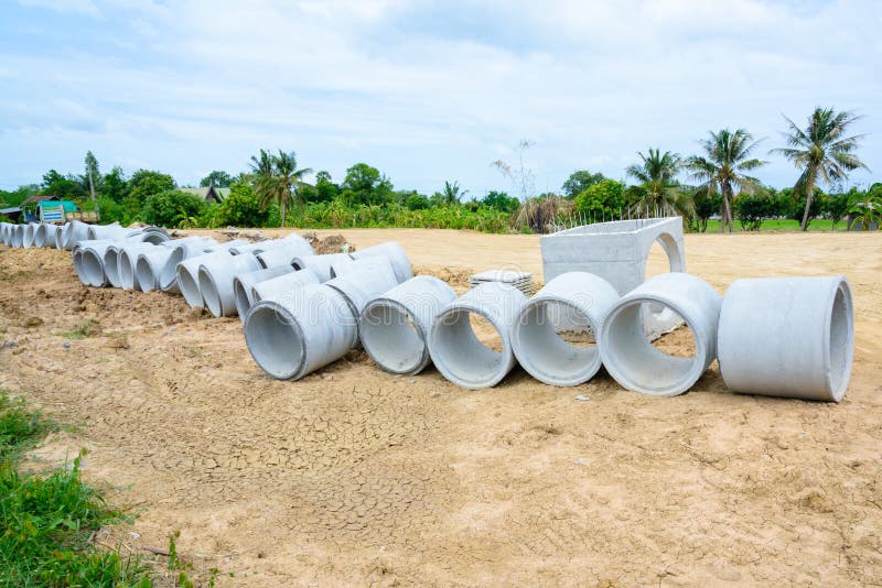 Concrete Drainage Pipes Stacked for Construction, Irrigation, in Stock ...