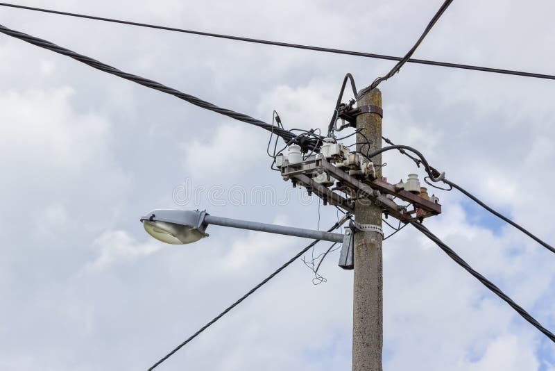 Concrete Electrical Pole with Street Lamp Stock Photo - Image of poles ...