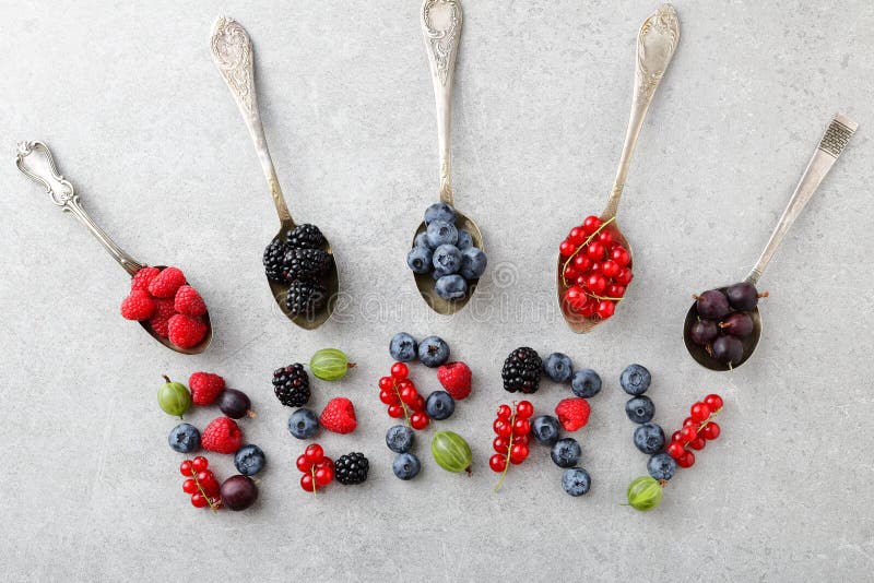 Concrete Food Background with Berry on Spoons Stock Photo - Image of ...