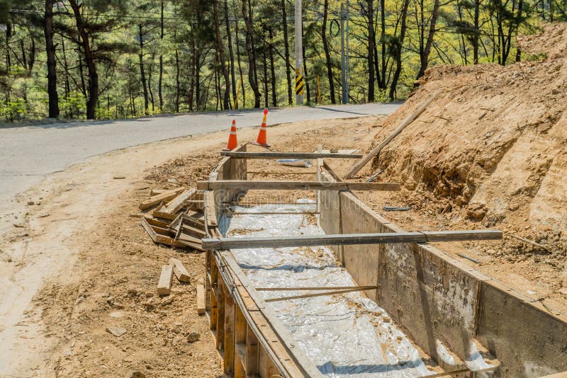 Concrete Forms beside One Lane Road Stock Image - Image of afternoon ...