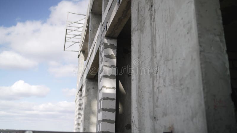 Unfinished Building Overlooking Cityscape with Cloudy Sky Stock Video ...