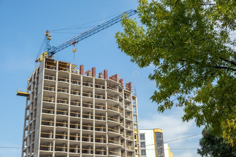 Concrete Frame of Tall Apartment Building Under Construction and Tower ...