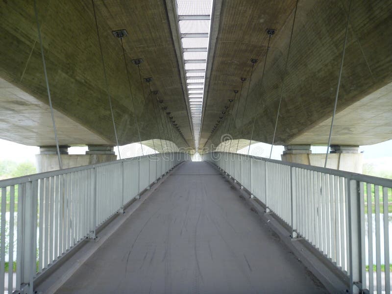 Concrete Highway Bridge with a Pedestrian Bridge Below Stock Image ...
